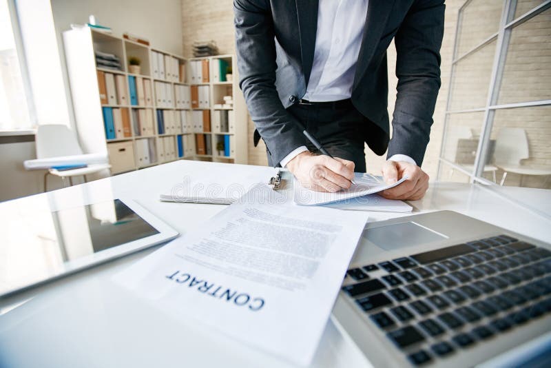 Signing the papers stock photo. Image of laptop, lifestyle - 27879928