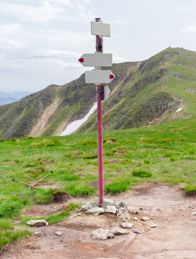 Signpost of Hiking Trails on the Background of Mountain Peak Stock ...