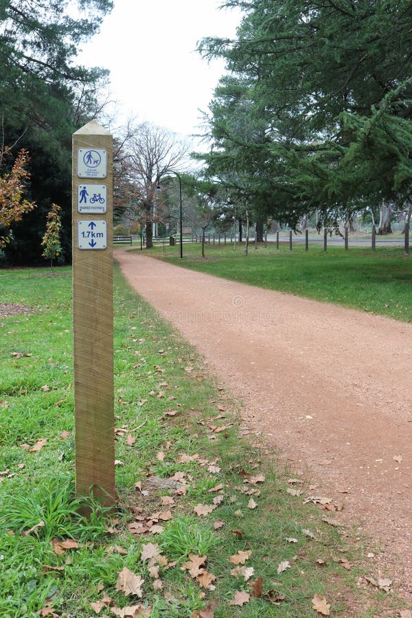 Signpost Indicating a Shared Footpath and Keep Dogs on Lead on a ...