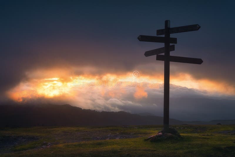 Signpost in the Mountain at Sunset Stock Photo - Image of mountain ...