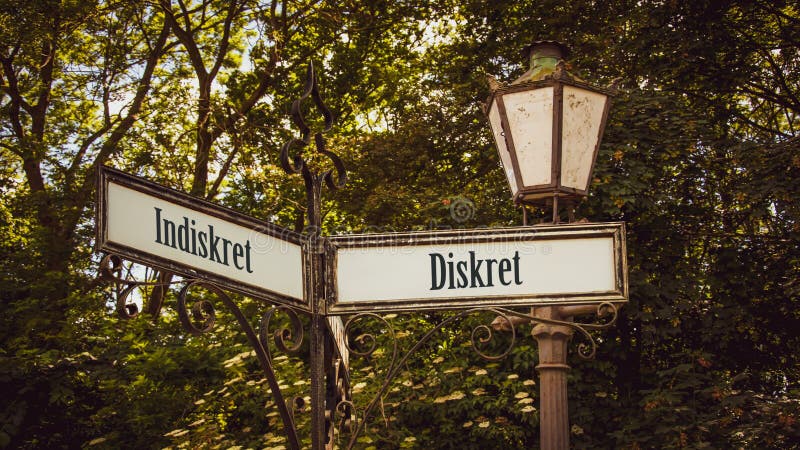 Signposts the Direct Way To Discreet Versus Indiscreet Stock Photo ...
