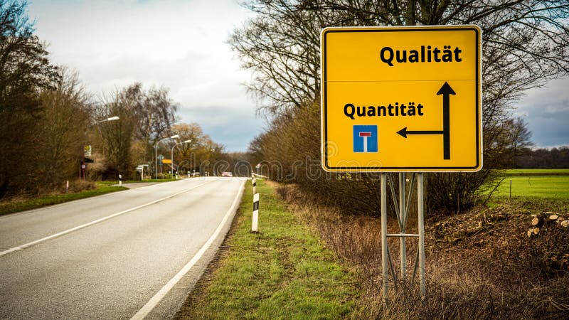 Signposts the Direct Way To Quality Versus Quantity Stock Photo - Image ...
