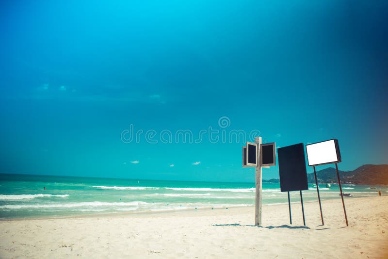 Signs boards on beach stock image. Image of advertisement - 98178587