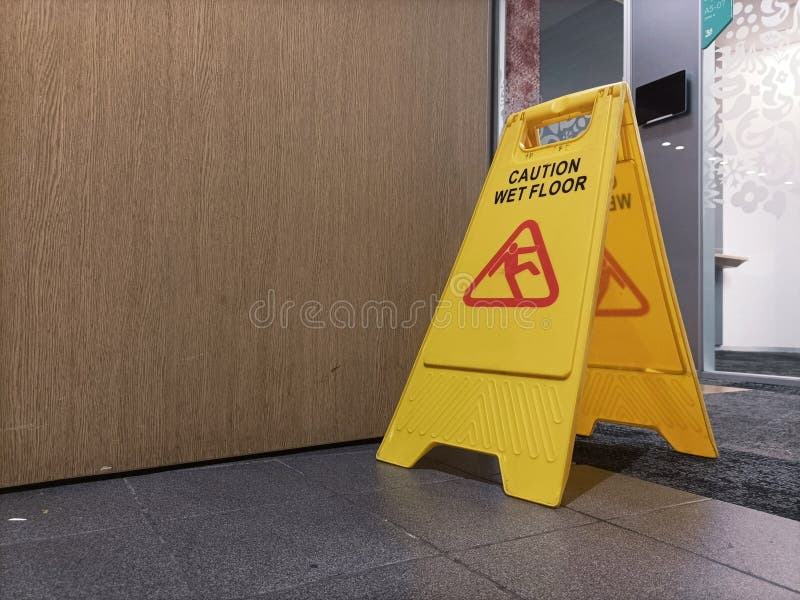 Symbol Signs Of Caution Wet Floor Are Installed On The Floor Stock Image Image Of Cleaner
