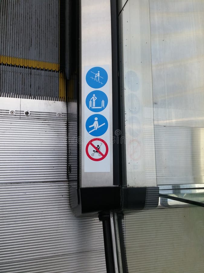 Signs on escalator stock image. Image of speed, symbol - 52637965