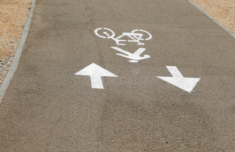 Signs Painted on the Cycle Path with Two Arrows and Also Pedestrian ...