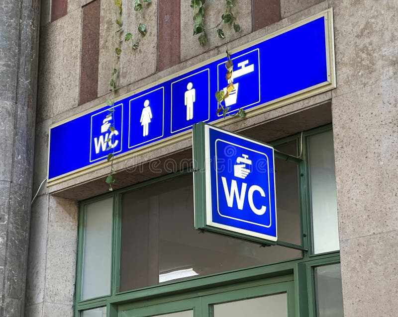 Signs of the Public Restroom at the Station Building Stock Photo ...