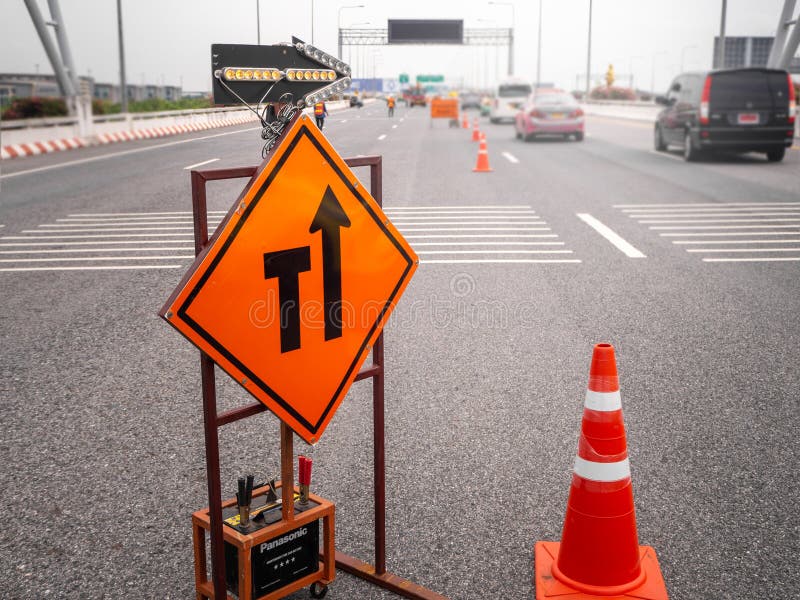 Signs Repairs Road and Worker on the Road Stock Image - Image of ...