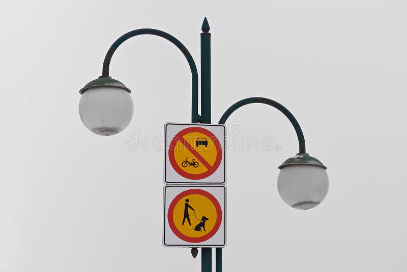 Signs on the street light stock photo. Image of allowed - 84924822