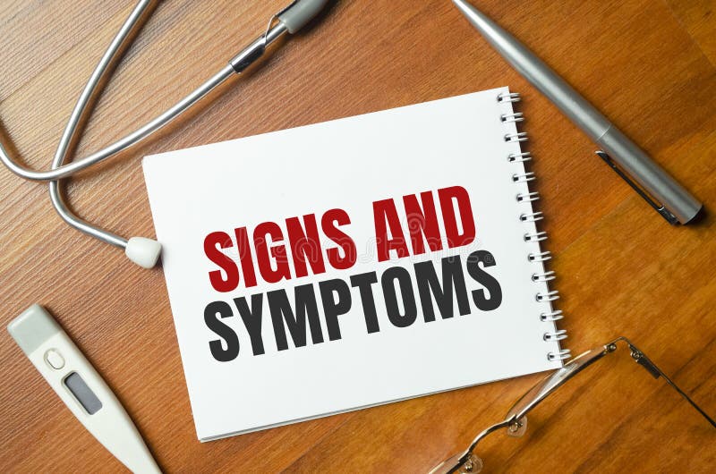 Signs and Symptoms Words on White Notebook and Stethoscope on Wooden ...