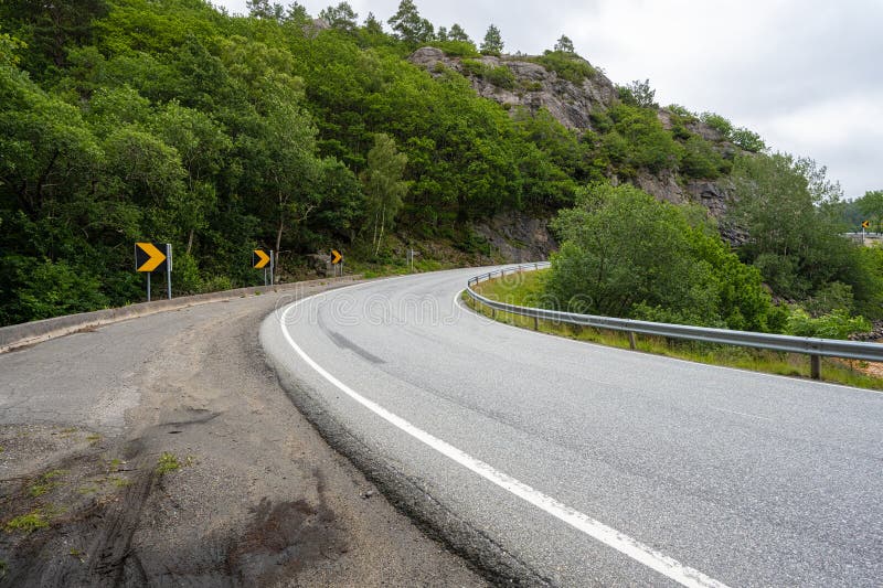 Signs in a Tight Road Curve.. Stock Photo - Image of black, signs ...