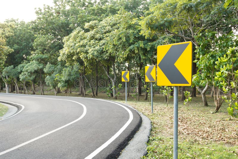 Left curve on Road stock image. Image of street, arrow - 21958687