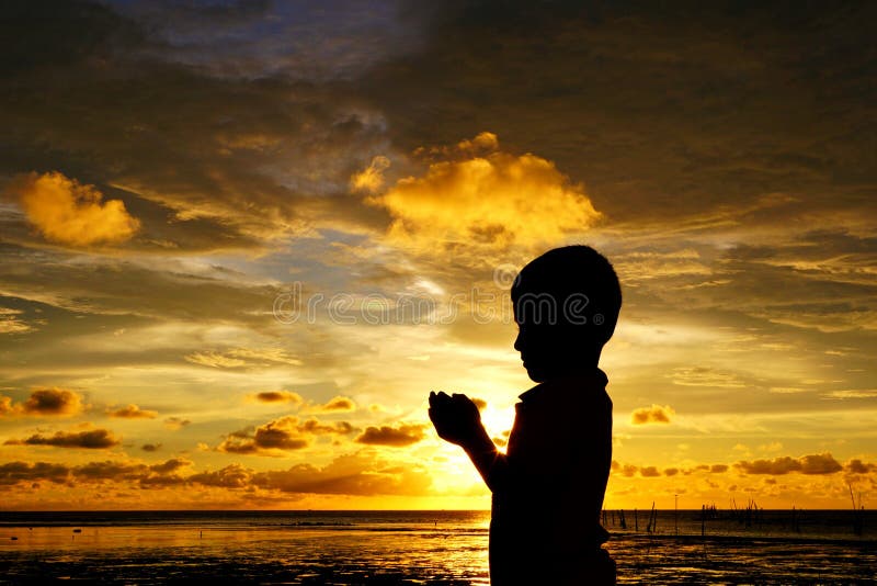 Sihlouette of Praying Kid during Sunset Stock Image - Image of praying ...