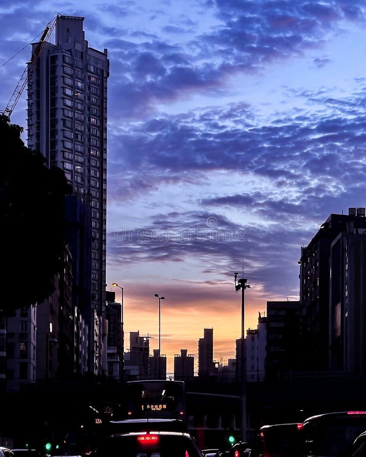 Silhouette of Building and City with Sunset Gradient Sky and White ...