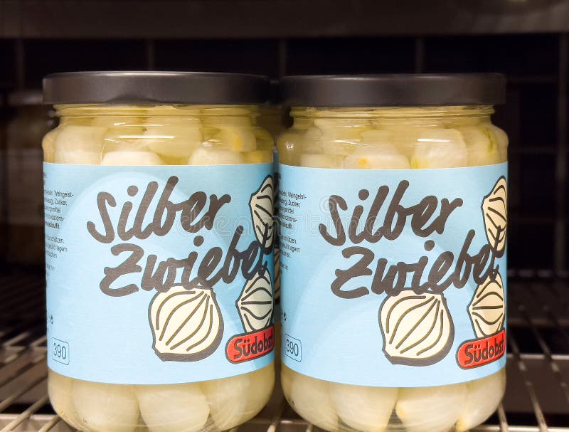Silberzwiebel Jars on Shelf with Light Blue Labels and Black Lids ...