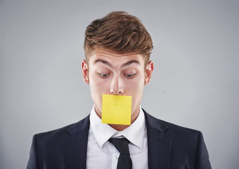 Silenced by Work. a Business Man with a Post it Note Stuck To His Mouth ...