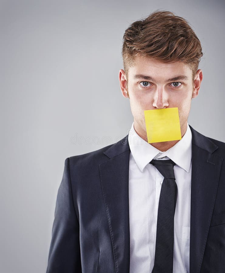 Silenced by Work. a Business Man with a Post it Note Stuck To His Mouth ...