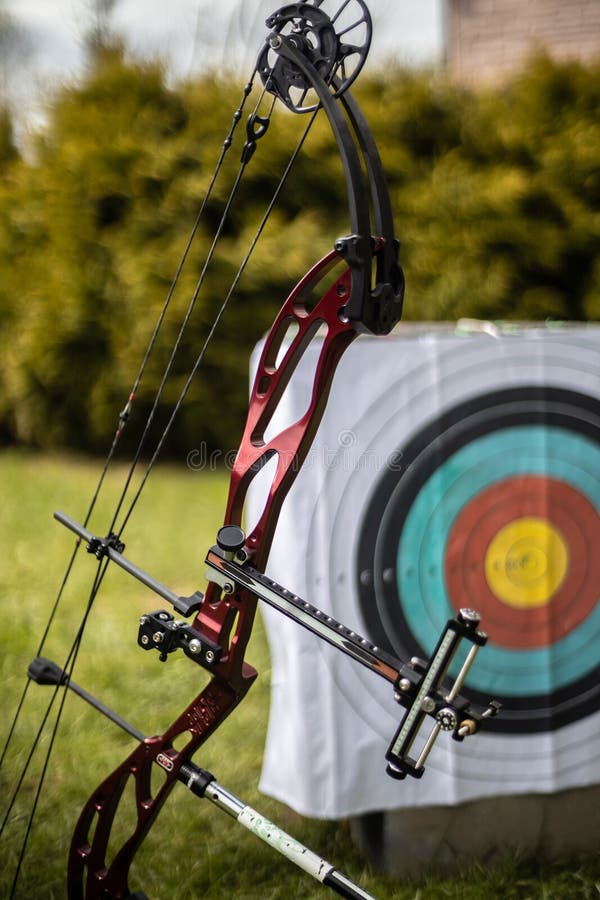 Bow and Arrows Positioned by Target in Grass Stock Photo - Image of ...