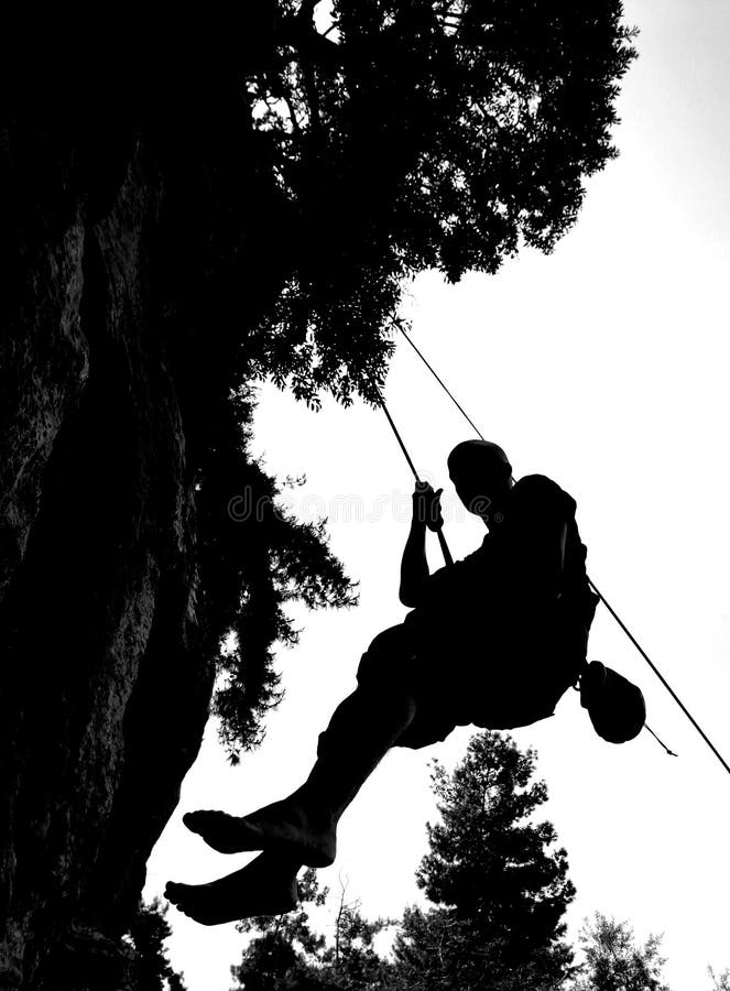 Silhouette of abseiler stock photo. Image of outside, rope - 4703260