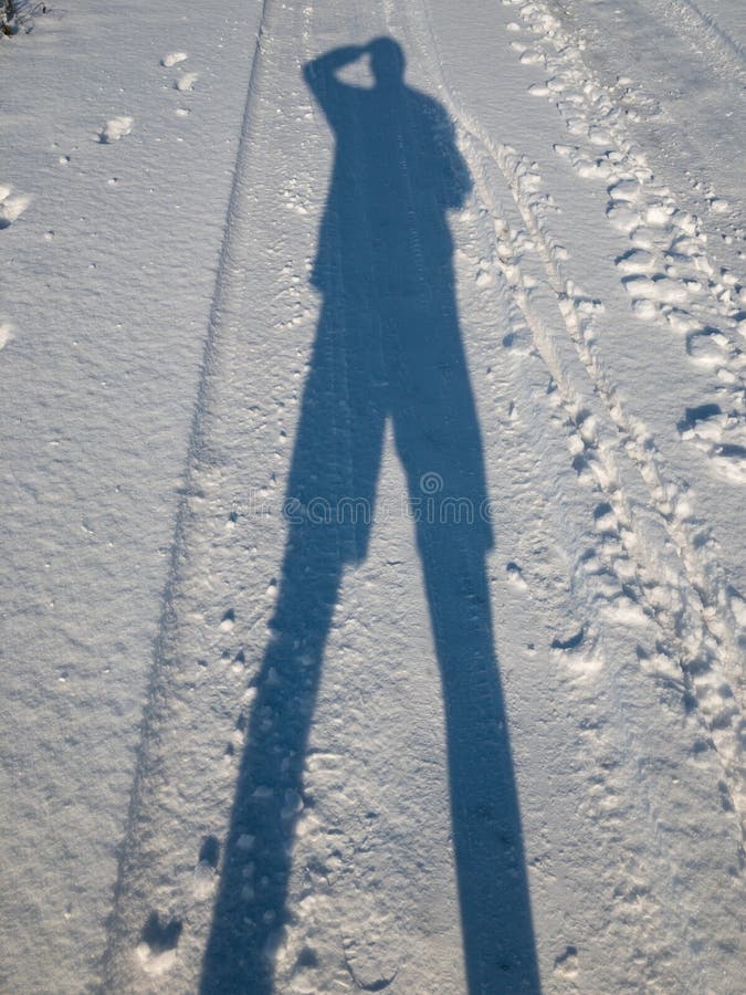 Silhouette of a Active Man Taking His Hand on the Head Stock Photo ...