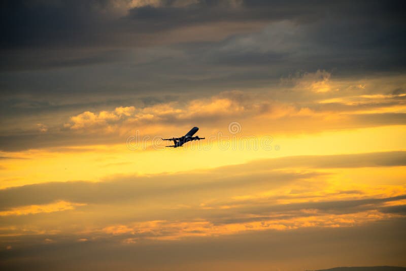Silhouette of Airplane at Sunset Stock Photo - Image of bright, black ...