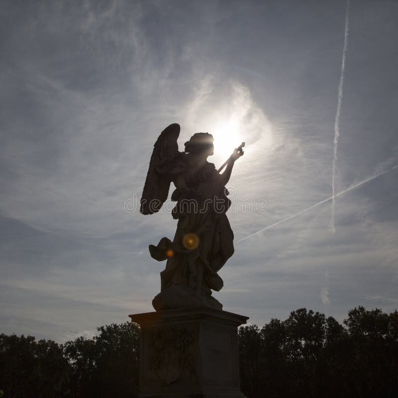 Silhouette of Angel Statue in Sunlight Reflection Stock Image - Image ...