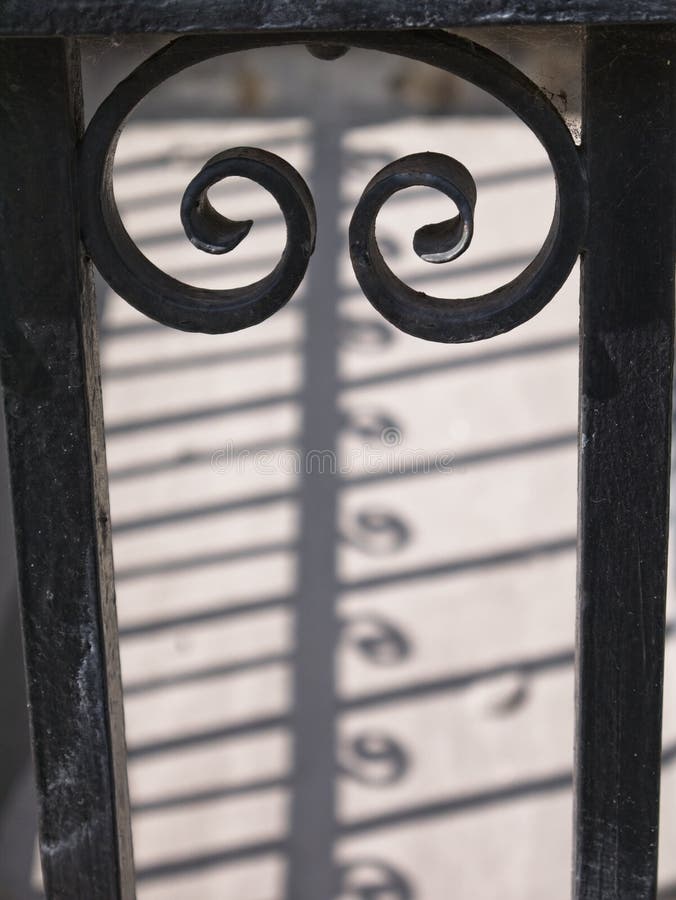 Silhouette of Antique Cast Iron Railing with Beautiful Shadow on the ...