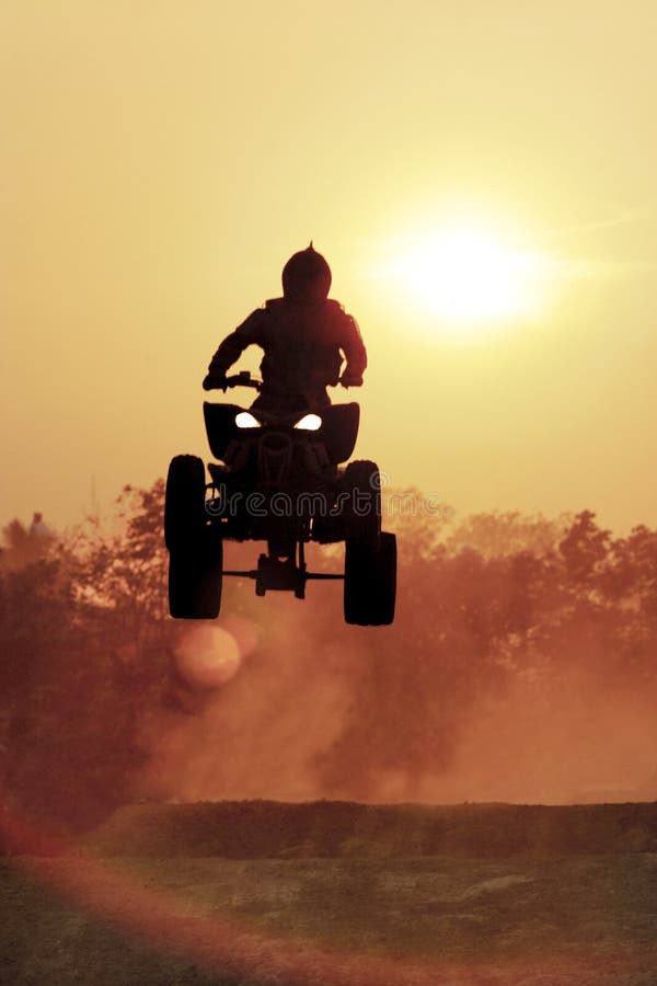 Atv rider 2 Jumping stock photo. Image of jump, jumping - 11772812