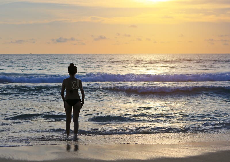 Silhouette Back View of Women at the Beautiful Scenery of Beach at ...