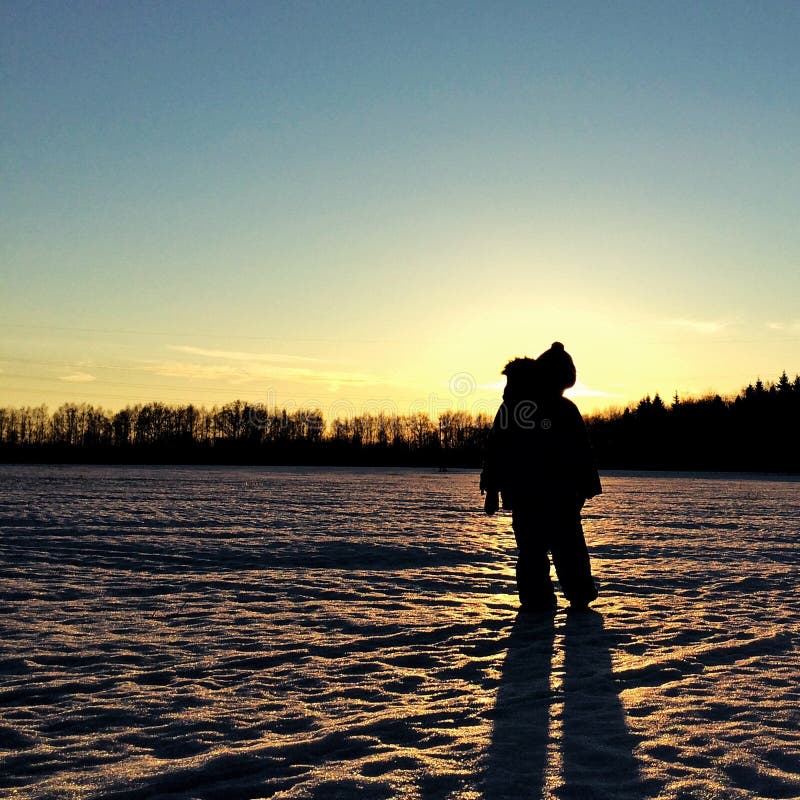 Silhouette backlit sunset stock image. Image of little - 68166561