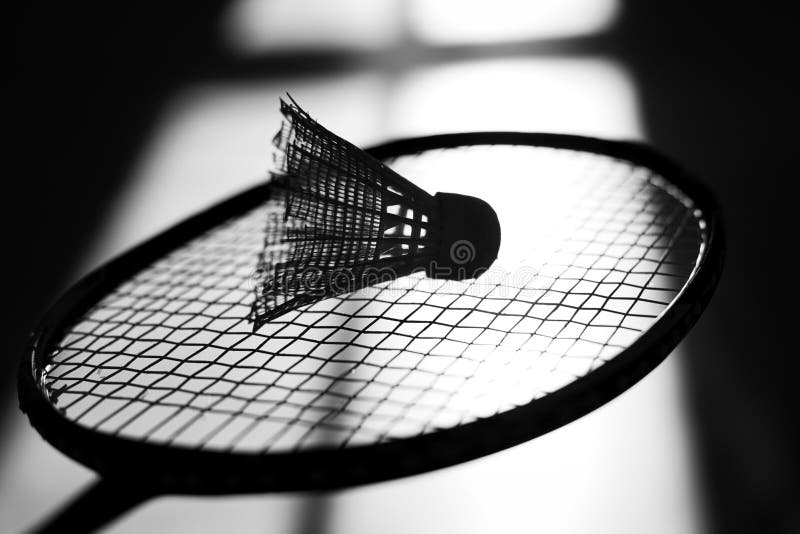 Silhouette of Badminton Racket and Shuttlecock Against the Background ...