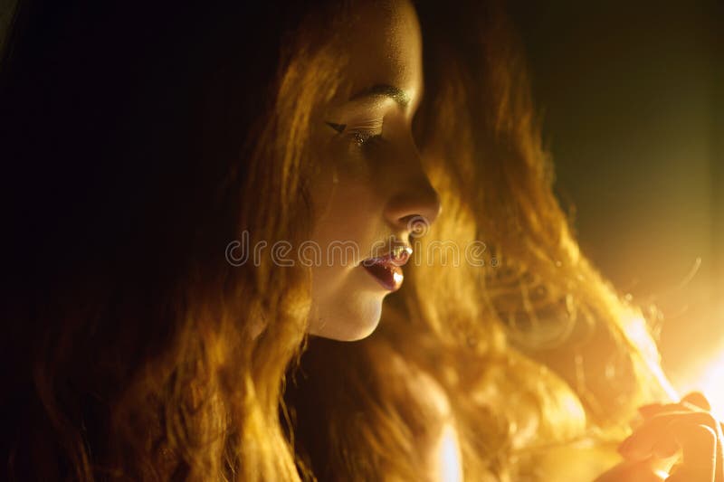 Silhouette of a Beautiful Young Woman Backlit Stock Photo - Image of ...