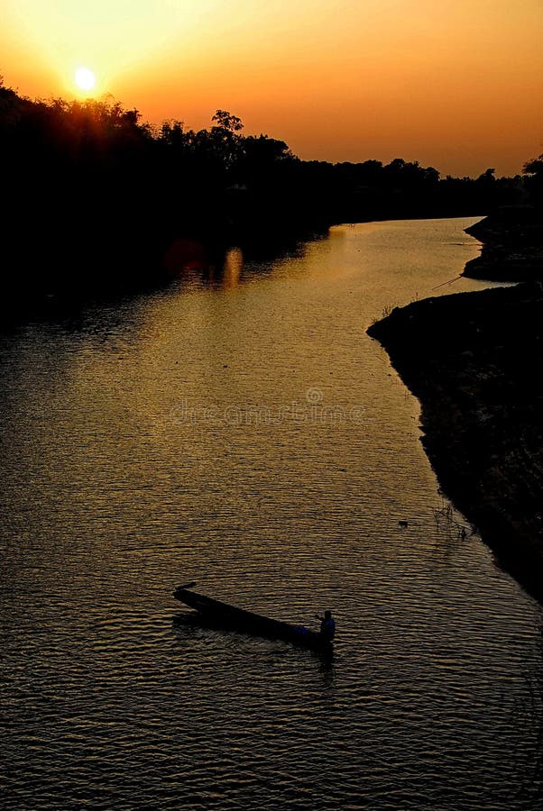 Silhouette boat on river stock photo. Image of fishing - 53962052