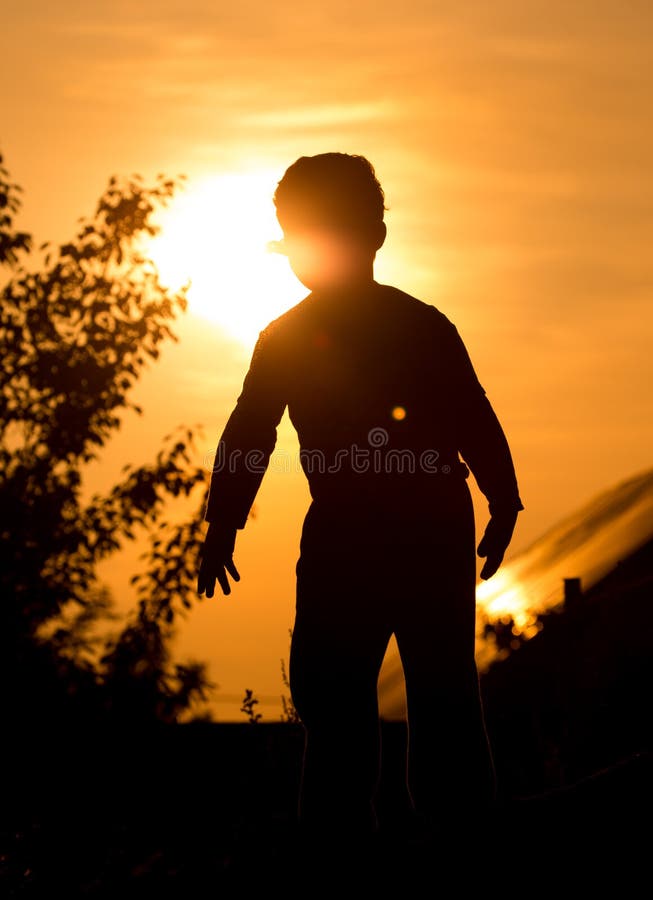 Silhouette of a Boy in the Sunset Stock Photo - Image of active ...
