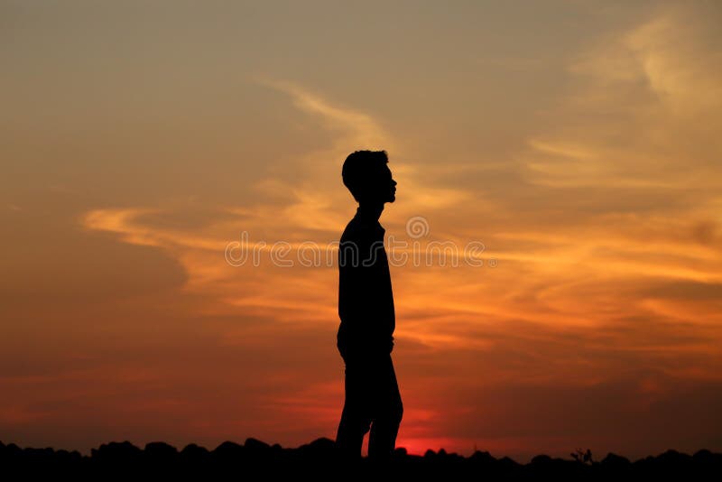 A Silhouette of a Man during Sunset Stock Photo - Image of relax, chill ...