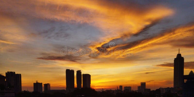 Silhouette of building stock photo. Image of city, sunset - 274365792