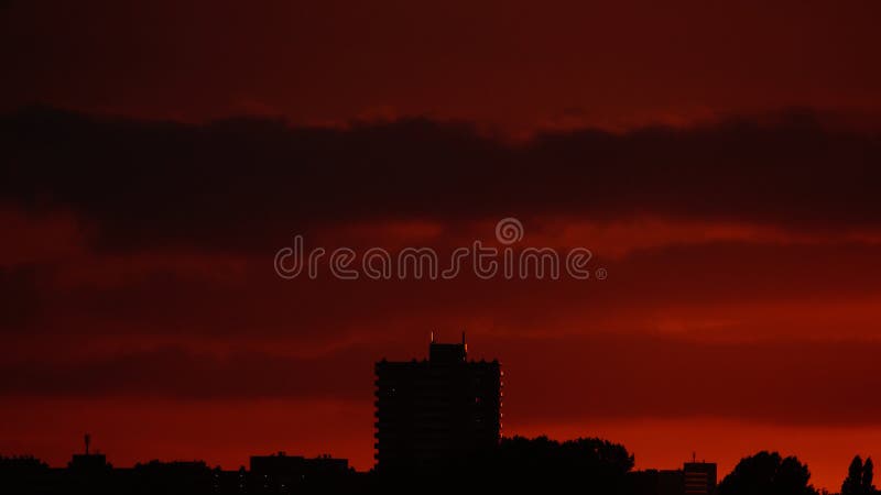 Silhouette Of Building Structures Against Red Skies Stock Photo - Image ...
