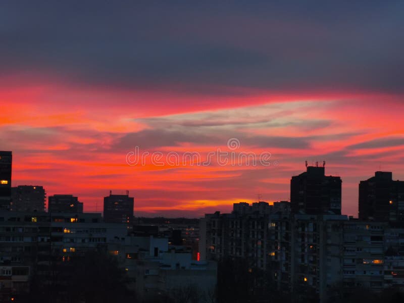 Silhouette of Buildings on a Sunset Stock Image - Image of gorgeous ...