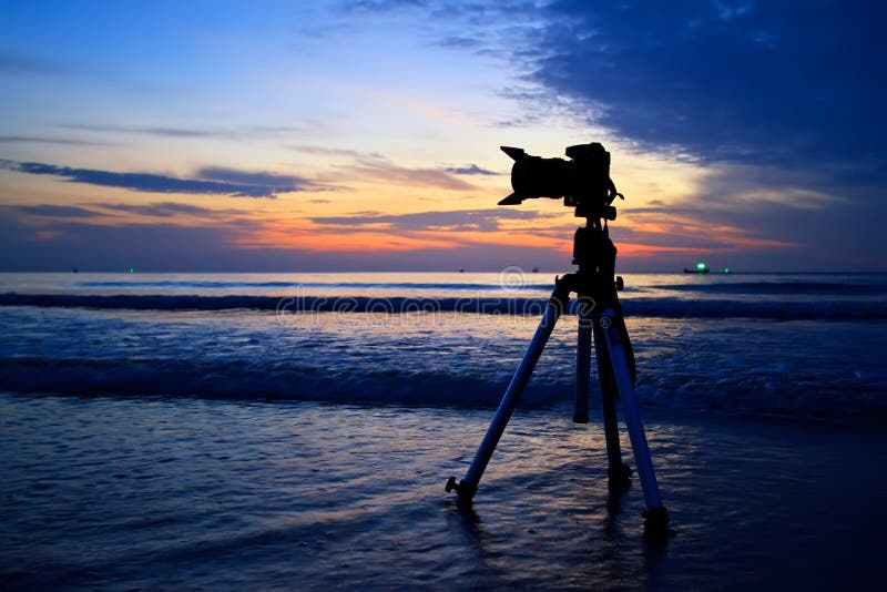 Silhouette Camera on the Beach Stock Photo - Image of twilight, black ...