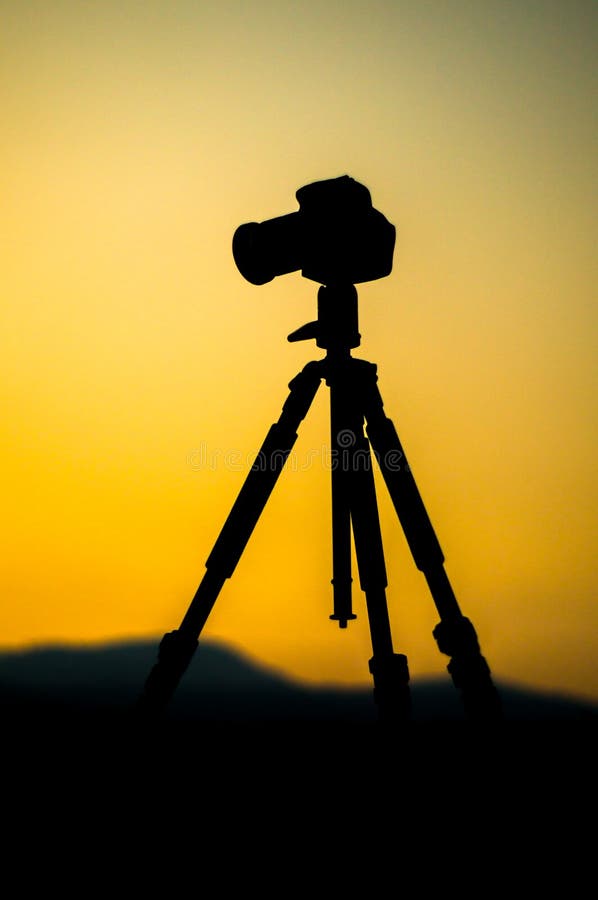 Silhouette of a camera stock photo. Image of lens, field - 38570652
