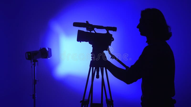 Professional Cameraman Filming on Set with Silhouette Stock Image ...