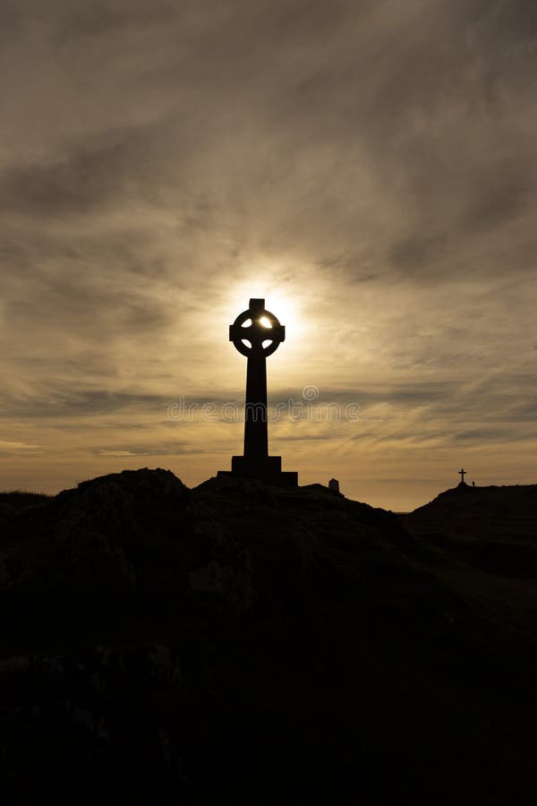 Silhouette of a Celtic Cross with the Evening Sun Directly Behind it ...