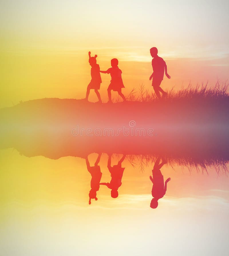 Silhouette Children Playing Happy Time at Sunset with Water Reflection ...