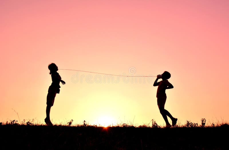 Silhouette Children Playing String Phone Stock Photo - Image of sunset ...