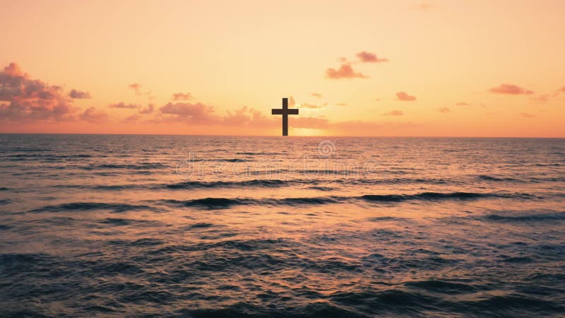 Silhouette of Christian Cross in the Ocean at Sunset Stock Video ...