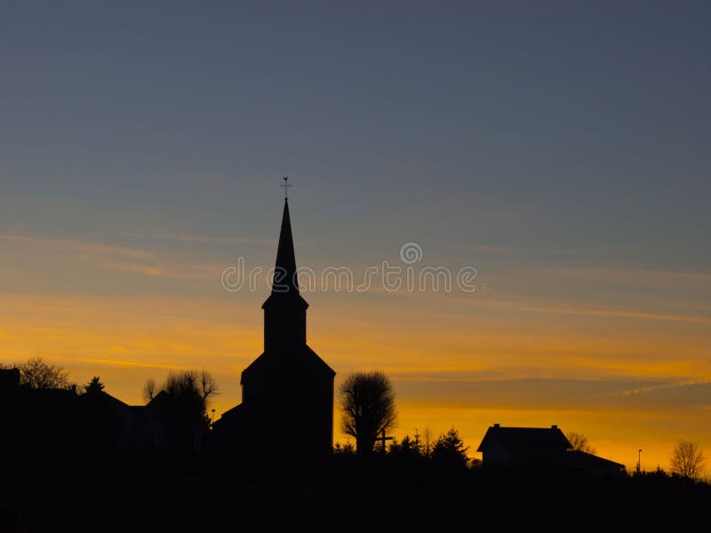 Silhouette of a Church and Trees during a Beautiful Sunset Stock Photo ...