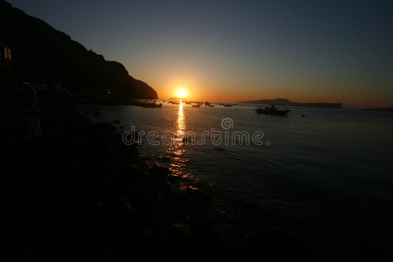 Silhouette of Cliffs Near the Beach on the Sunset Stock Photo - Image ...