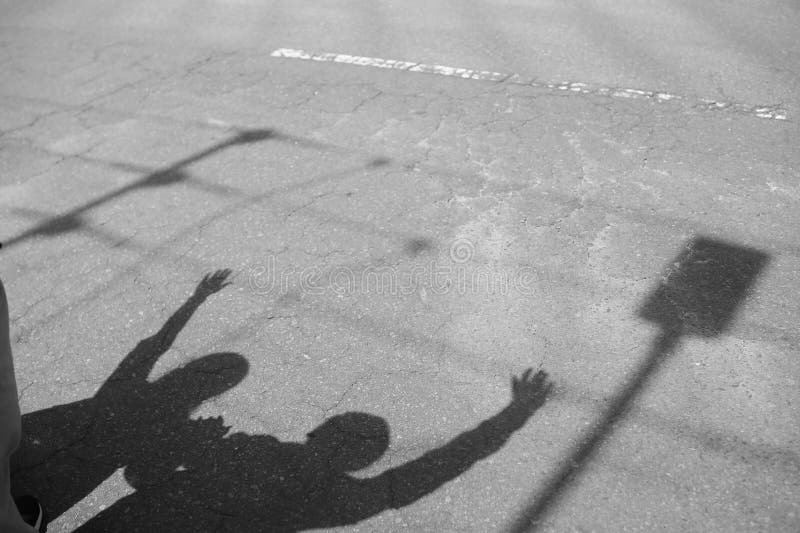 A Silhouette of a Couple Can Be Seen Walking Hand in Hand. the Setting ...
