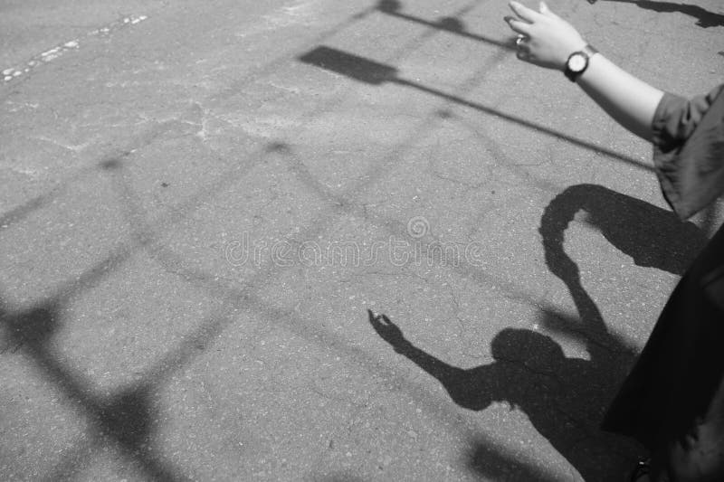 A Silhouette of a Couple Can Be Seen Walking Hand in Hand. the Setting ...