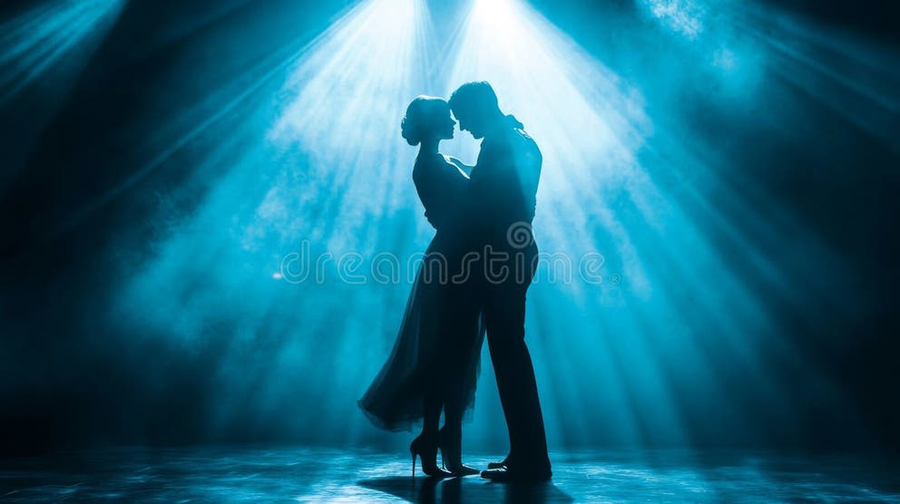 Silhouette of a Couple Dancing Romantically Under Blue Stage Lights ...